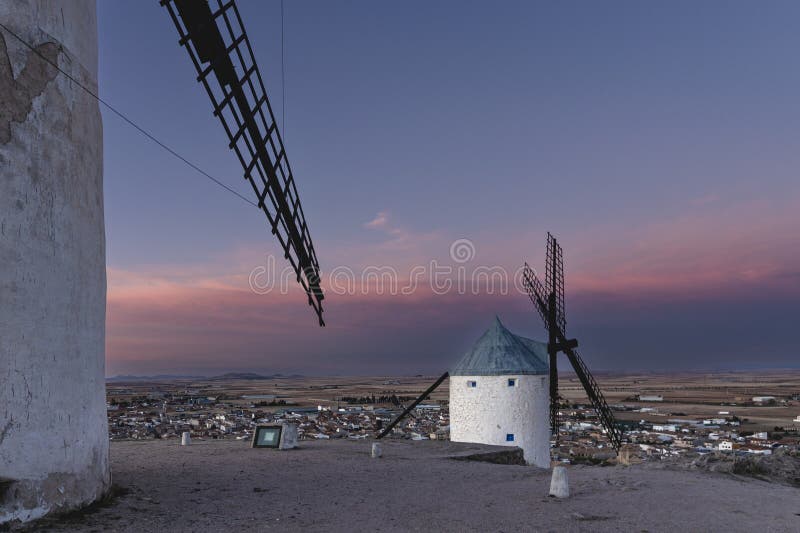 Timeless Heritage: Exploring the Historic Consuegra Windmills Against a ...