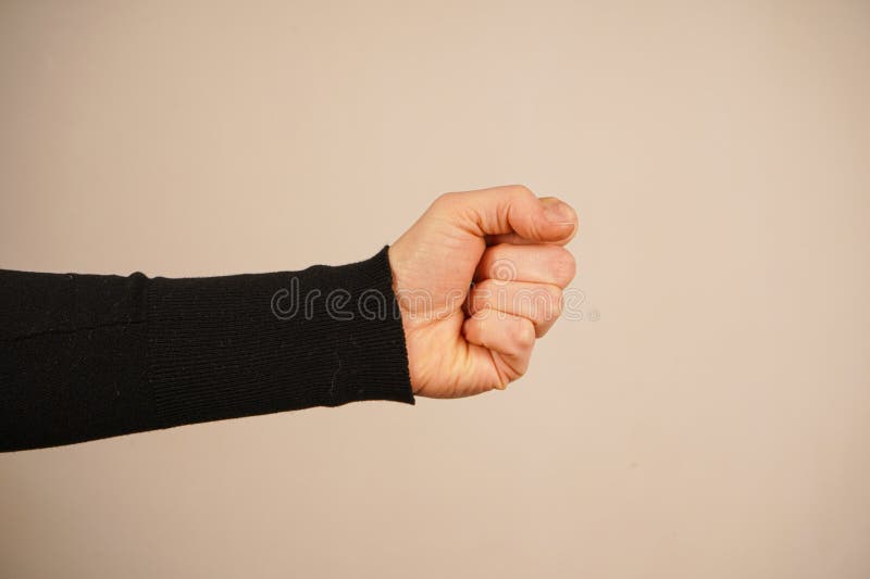 A Timeless Symbol of Courage. the Hand Forms a Strong Fist, Symbolizing ...