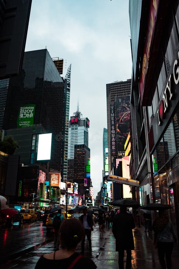 Times Square on rainy day editorial image. Image of commercial - 150960675
