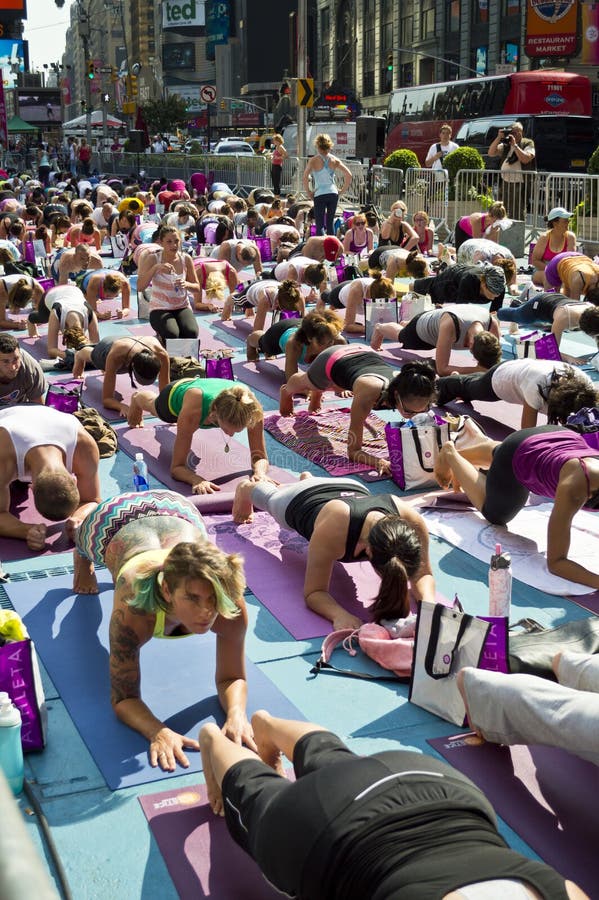 Times Square Yoga Class editorial stock photo. Image of square - 25368838
