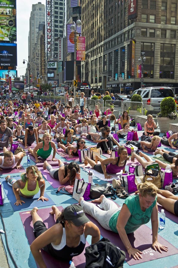 Times Square Yoga Class editorial photo. Image of exercise - 25371276