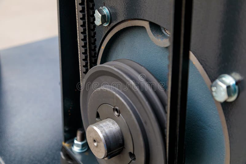 Close-up of Timing Belt and Pulley System Ensuring Smooth Operation ...