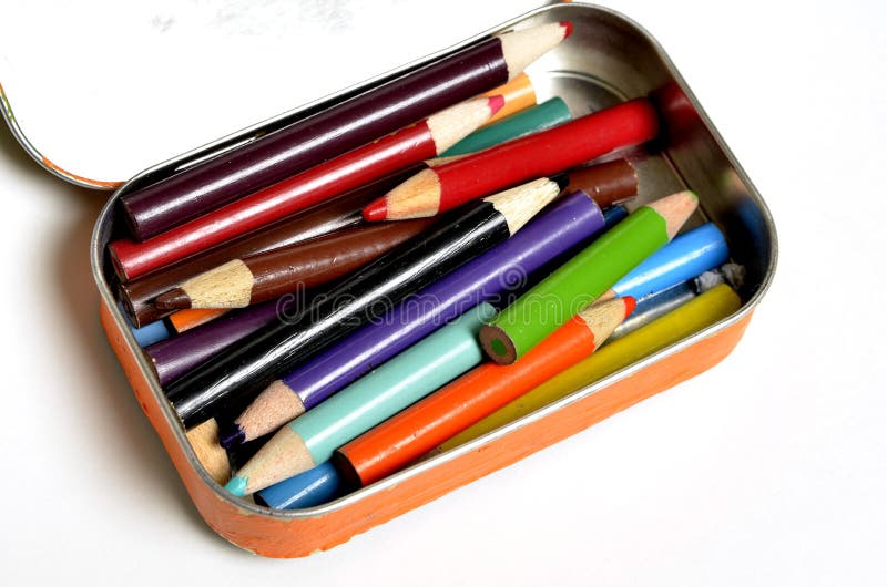 Tin Bin of Colored Pencils stock image. Image of concept - 59220883