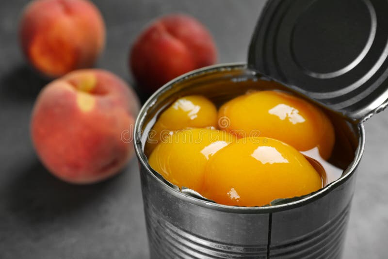 Tin Can with Conserved Peach Halves Stock Photo - Image of natural ...