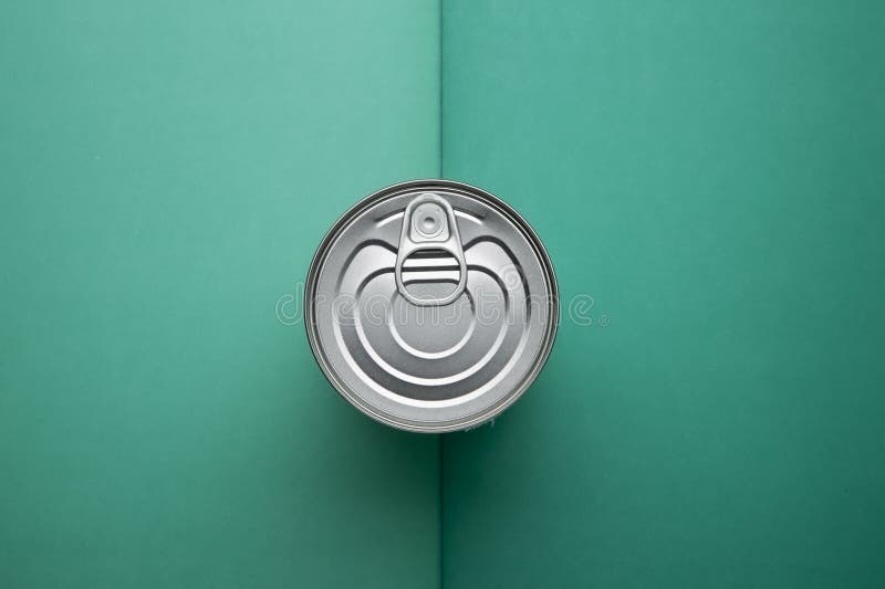 Tin Can Viewed from Above on Green Color Background Stock Photo - Image ...