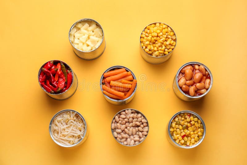 Tin Cans with Different Food on Color Background Stock Photo - Image of ...