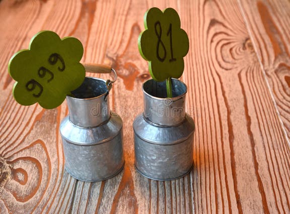 Tin Cans with Order Numbers in a Cafe on a Wooden Table Stock Photo ...