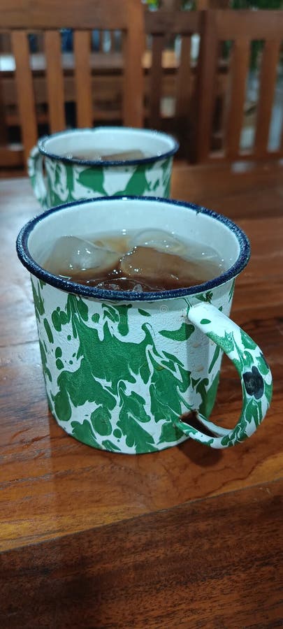 Tin Cup Filled with Iced Tea Stock Image - Image of water, fresh: 271615101