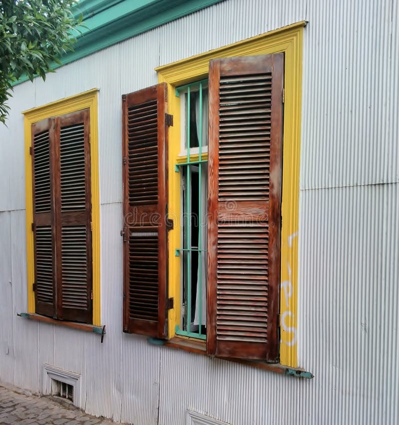 Tin wall with two windows. stock photo. Image of american - 131819586