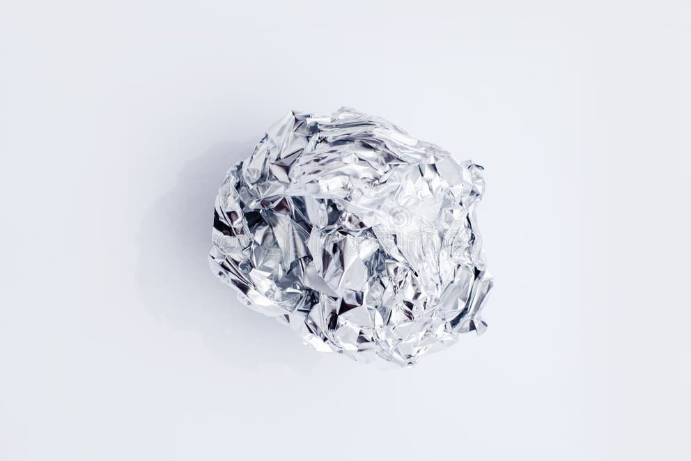 Tinfoil Ball Isolated on White Stock Photo - Image of metallic, texture ...