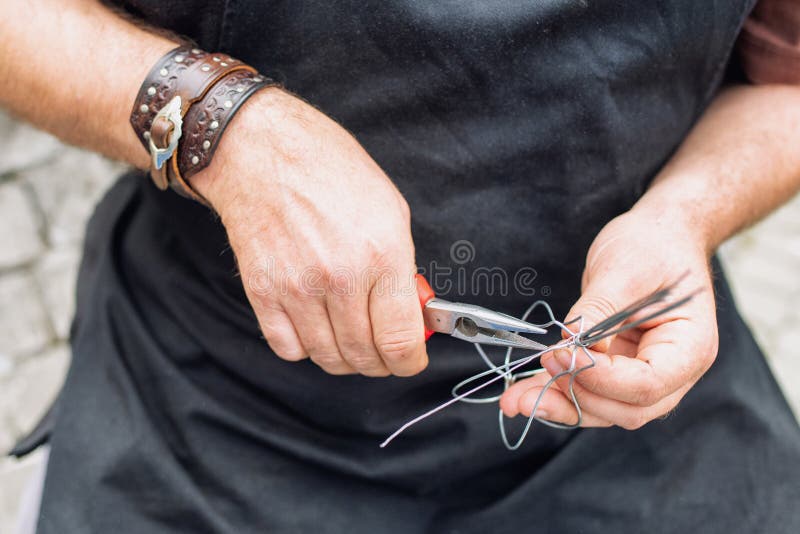 Tinker Drotar Making a Product from Wire. Traditional Folk Art in ...
