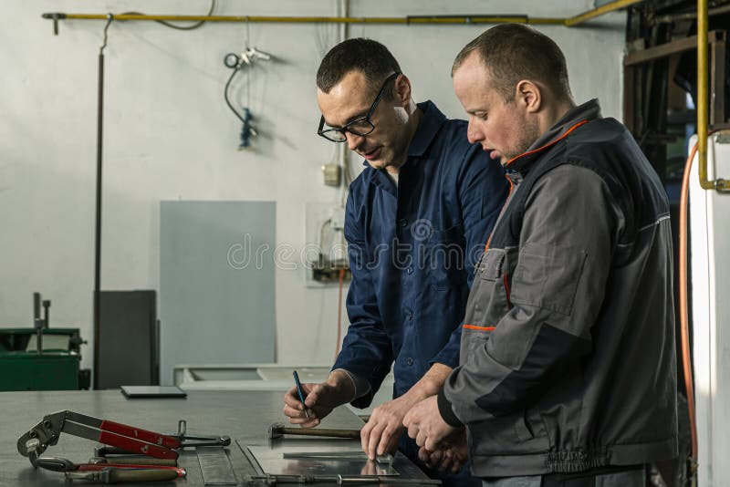A Tinsmith and His Fellow Colleague Engineer Stock Image - Image of ...