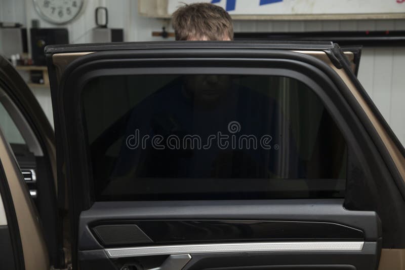 Tinting of Car Windows.Window Film for Car Stock Photo - Image of ...