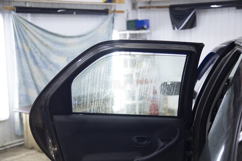 Tinting of Car Windows.Window Film for Car Stock Image - Image of foil ...