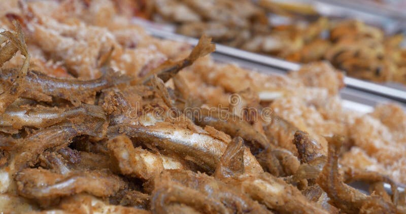 Small Fried Fish in Batter. Tiny Battered and Fried Fish Stock Video ...