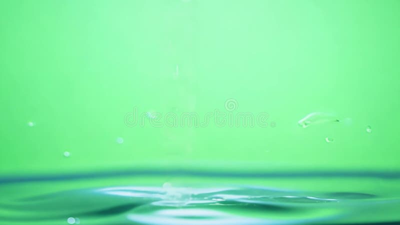 Tiny Bubbles Rise and Burst Briefly Interrupting the Smooth Reflective ...