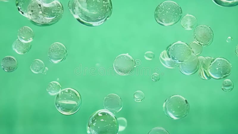 Tiny Bubbles Rise and Burst Creating Intricate Patterns Across the Surface. Green Screen ...