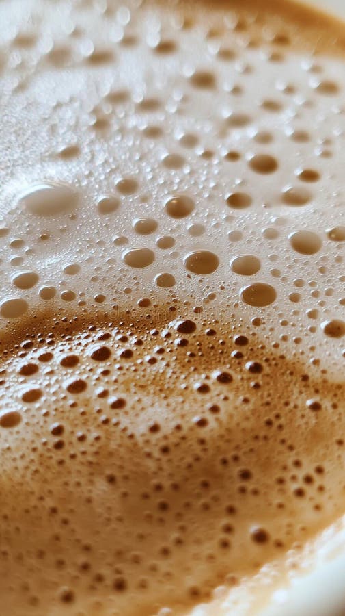 Tiny Bubbles Rise To the Surface of a Freshly Brewed Cup of Coffee ...