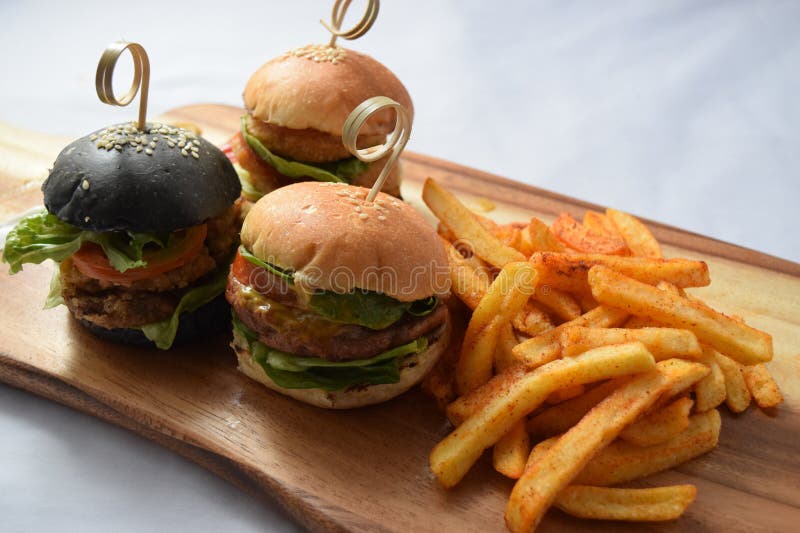 Mini Burgers stock image. Image of vegetable, served - 276756507