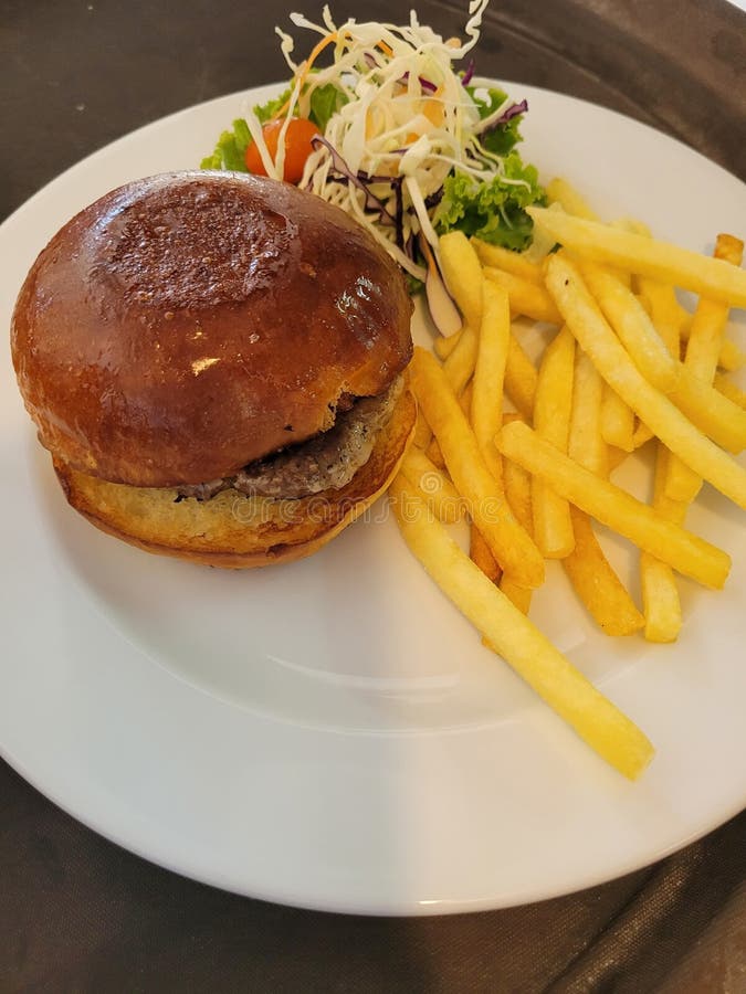Tiny Burger with fries stock photo. Image of hungry - 277682952