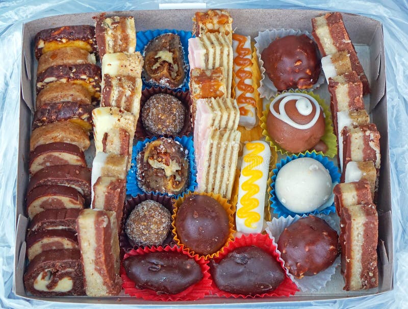 Tiny cakes stock photo. Image of tiny, packed, mini - 201270672