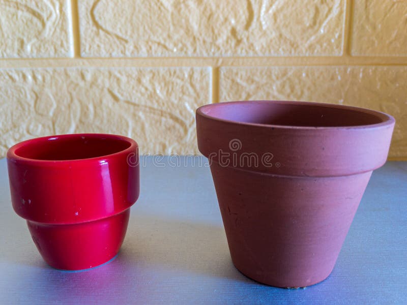 Tiny Ceramic Red Pot with Miniature Terracotta Pot Stock Photo - Image ...