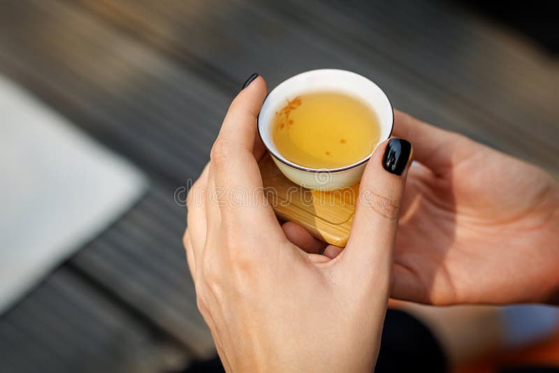 Tiny Chinese Teacup in Woman S Hands during a Tea Ceremony Stock Photo ...