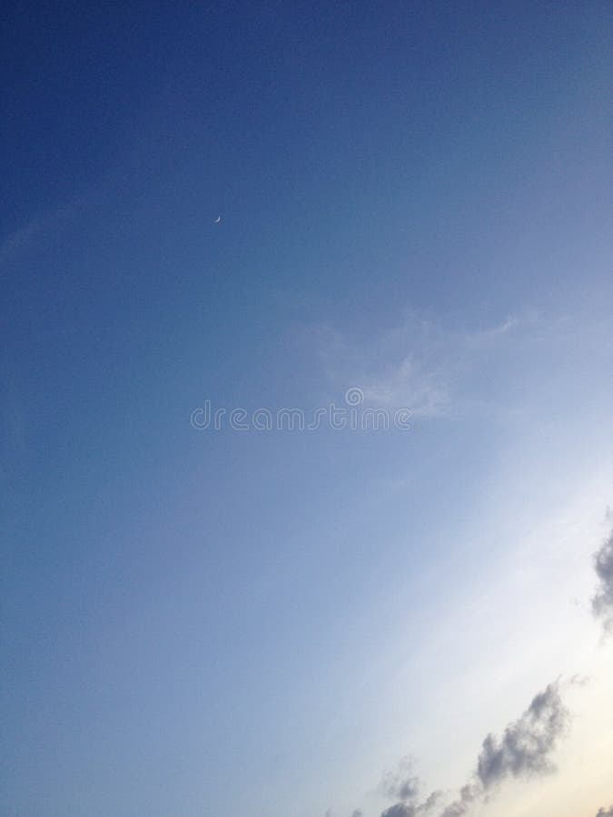 Tiny Crescent Moon Up in the Bright Blue Stock Photo - Image of ...