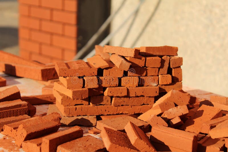 Tiny Dark Orange Bricks on a Table at Sunset Color Stock Image - Image ...
