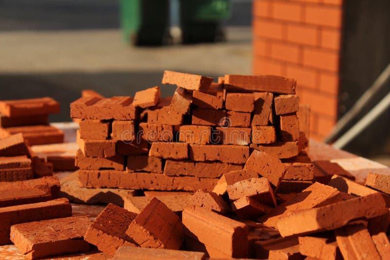 Tiny Dark Orange Bricks on a Table at Sunset Color Stock Image - Image ...