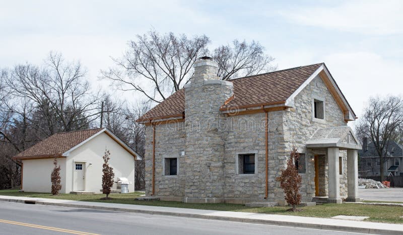 Tiny Eco Stone House & Garage Stock Photo - Image of downsize, grass ...