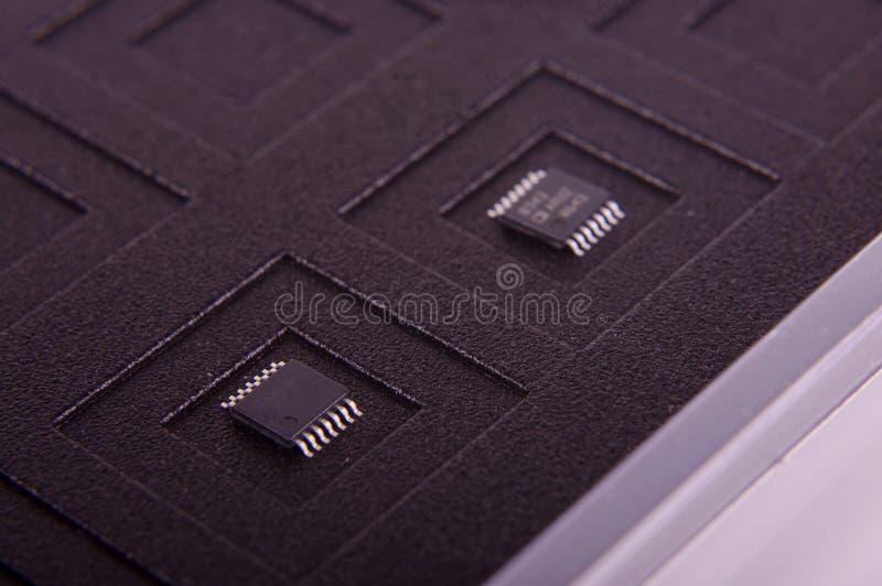 Tiny Electronics Chip Component on the Black Antistatic Mat Stock Photo ...