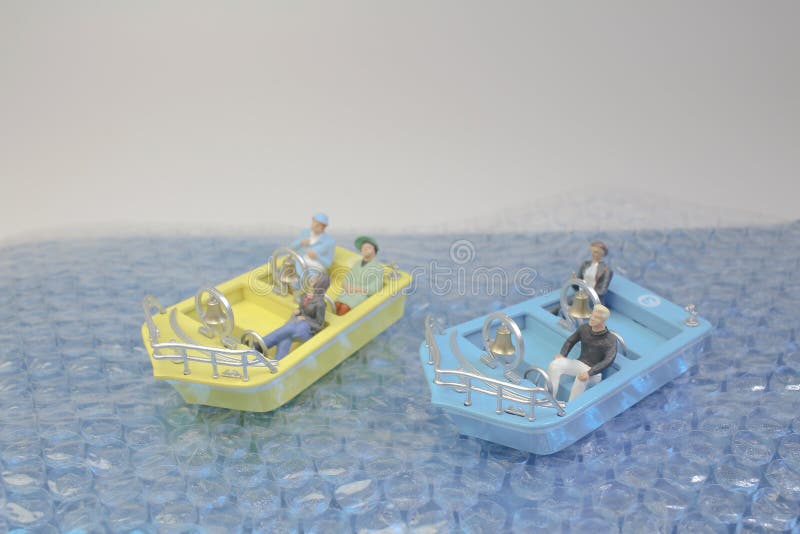 A Tiny Figure with a Small Boat Stock Photo - Image of miniatures, tiny ...