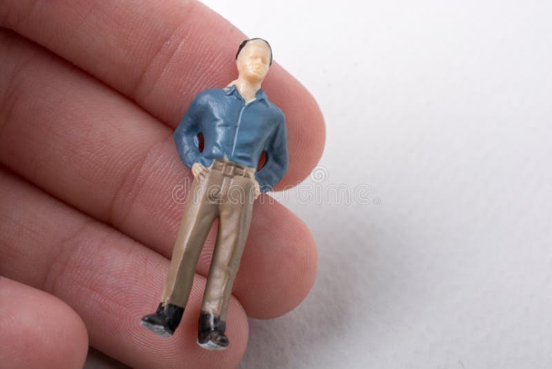 Tiny Figurine of Man Model in View Stock Image - Image of male ...