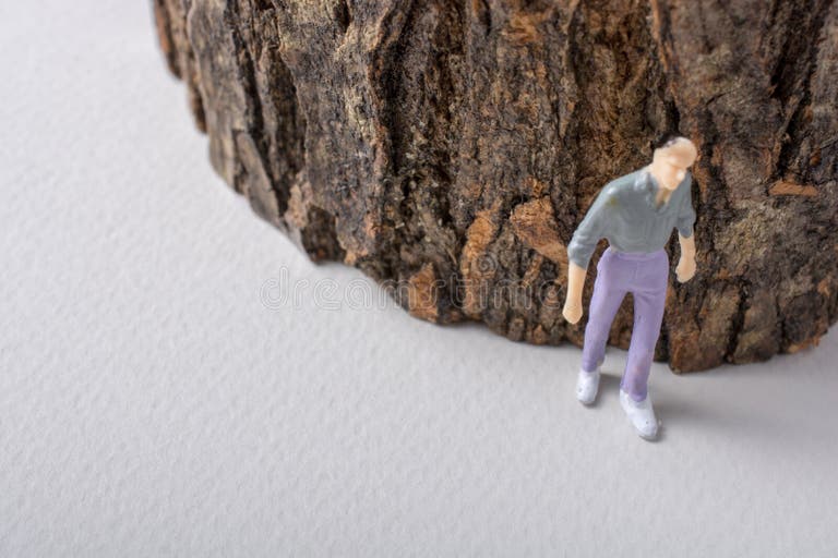 Tiny Figurine of Men Model beside a Tree Stock Photo - Image of model ...