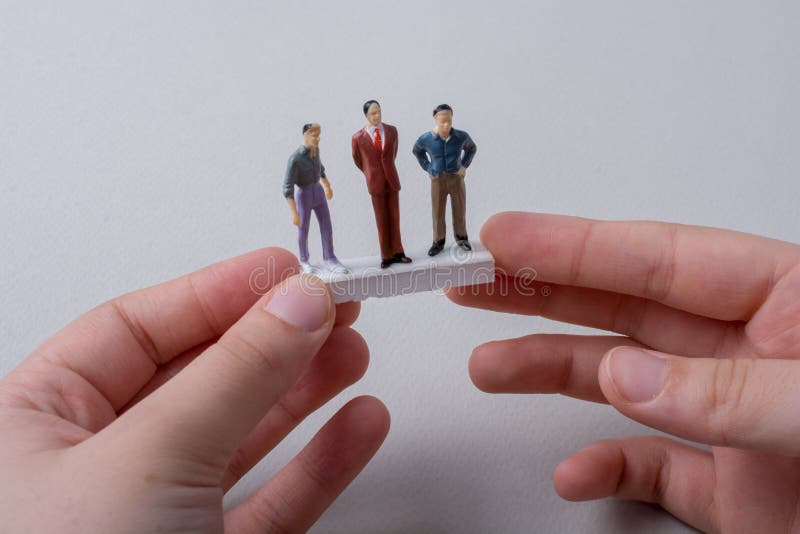 Tiny Figurines of Men Model in View Stock Photo - Image of talking ...