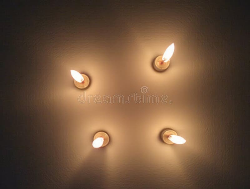 Tiny Flickering Candles with Soft Light Halos in the Bottom Corners ...