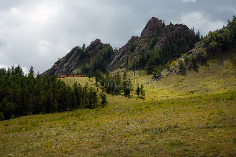 Tiny Houses Surrounded by Trees on the Ridge of the Mountain. Small ...