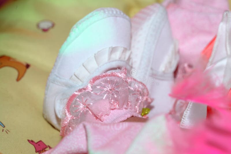 Tiny Leg on Pink Feather Background Stock Photo - Image of closeup ...