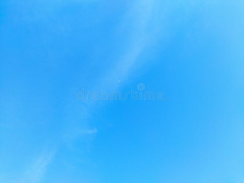 Tiny Moon, Shadow Clouds and Azure Blue Sky Stock Photo - Image of ...