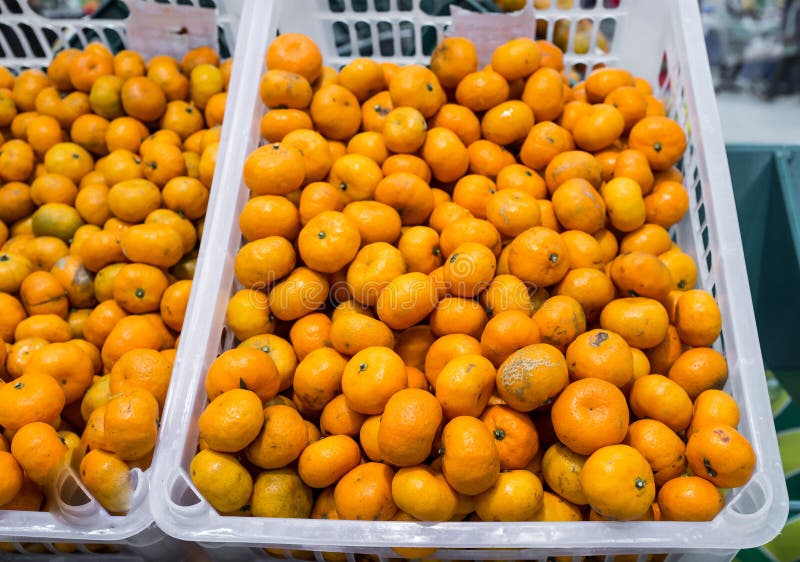 Tiny Orange in Plastic Box stock photo. Image of groceries - 36434800