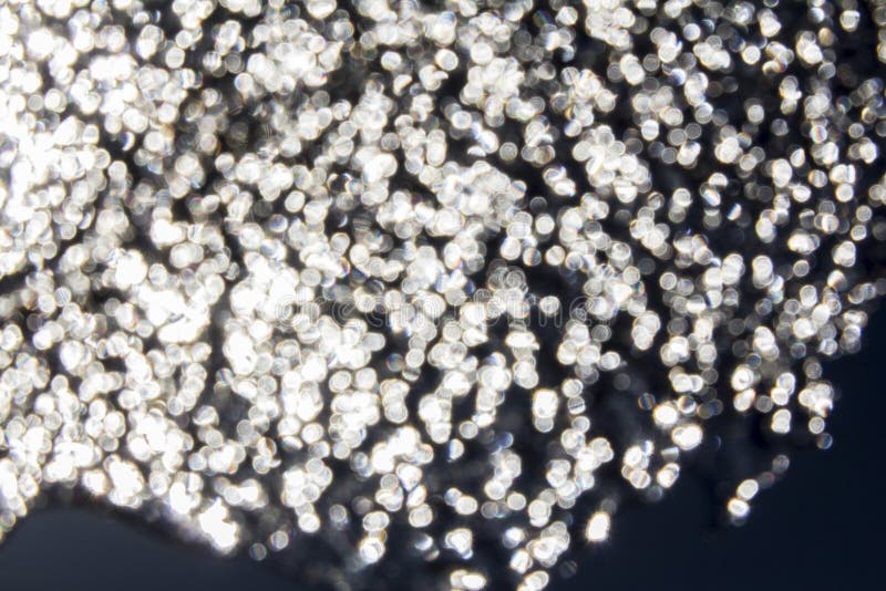 Tiny Patches of Light Shining through Dark Surface Stock Photo - Image ...