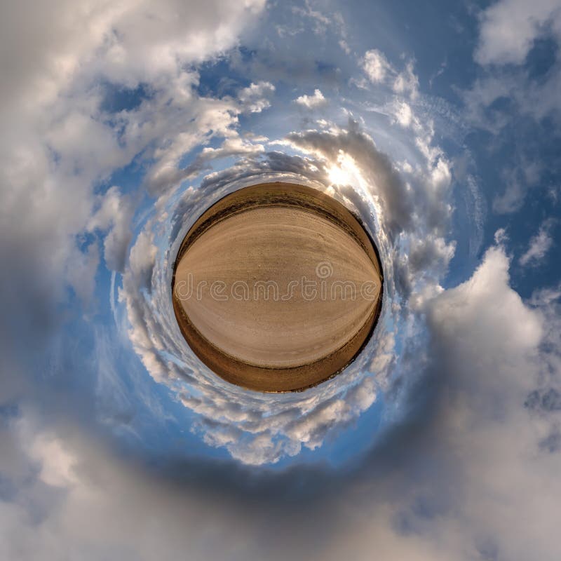 Tiny Planet in Blue Overcast Evening Sky with Beautiful Clouds with ...