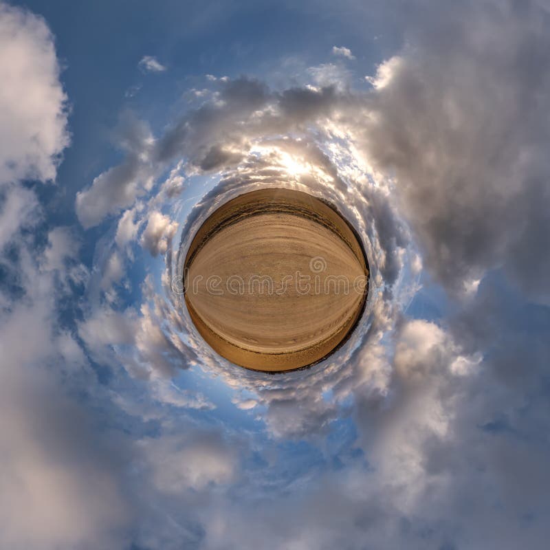 Tiny Planet in Blue Overcast Evening Sky with Beautiful Clouds with ...
