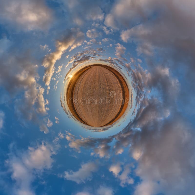 Tiny Planet in Blue Overcast Evening Sky with Beautiful Clouds with ...