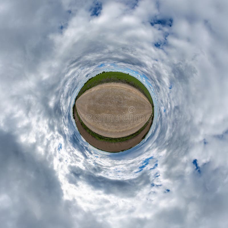 Tiny Planet in Blue Overcast Evening Sky with Beautiful Clouds with ...