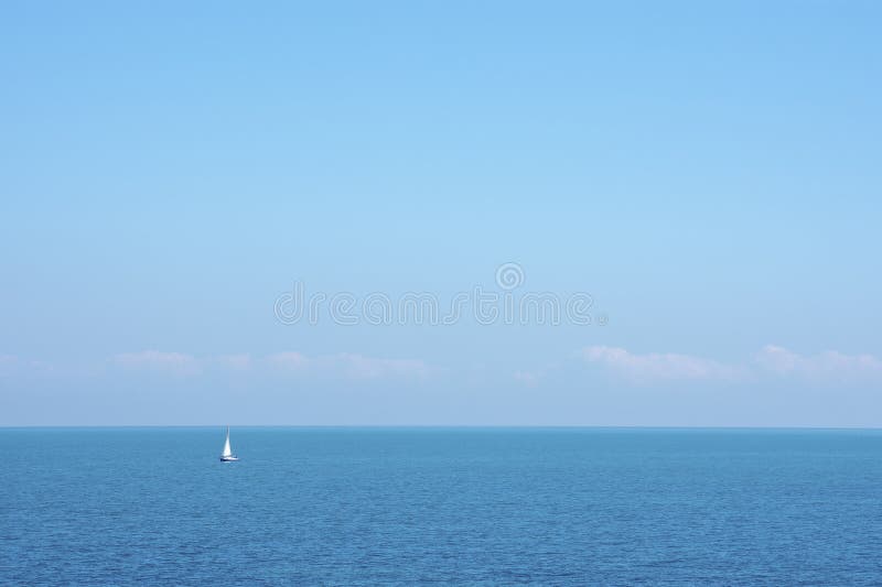 Tiny Sailboat on the Empty Sea Stock Photo - Image of infinity ...