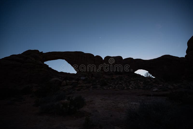 Tiny Sliver of the Moon Over the Spectacles Stock Photo - Image of dusk ...