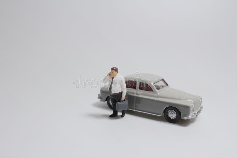A Tiny Small Business Figure with Car Stock Photo - Image of ...