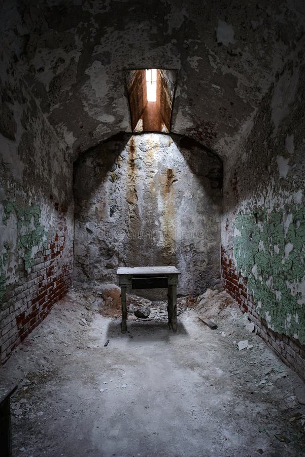 Tiny old prison cell stock photo. Image of table, walls - 11676690